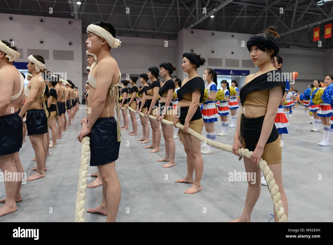Chinese entertainers perform with ropes to act like boat trackers ...