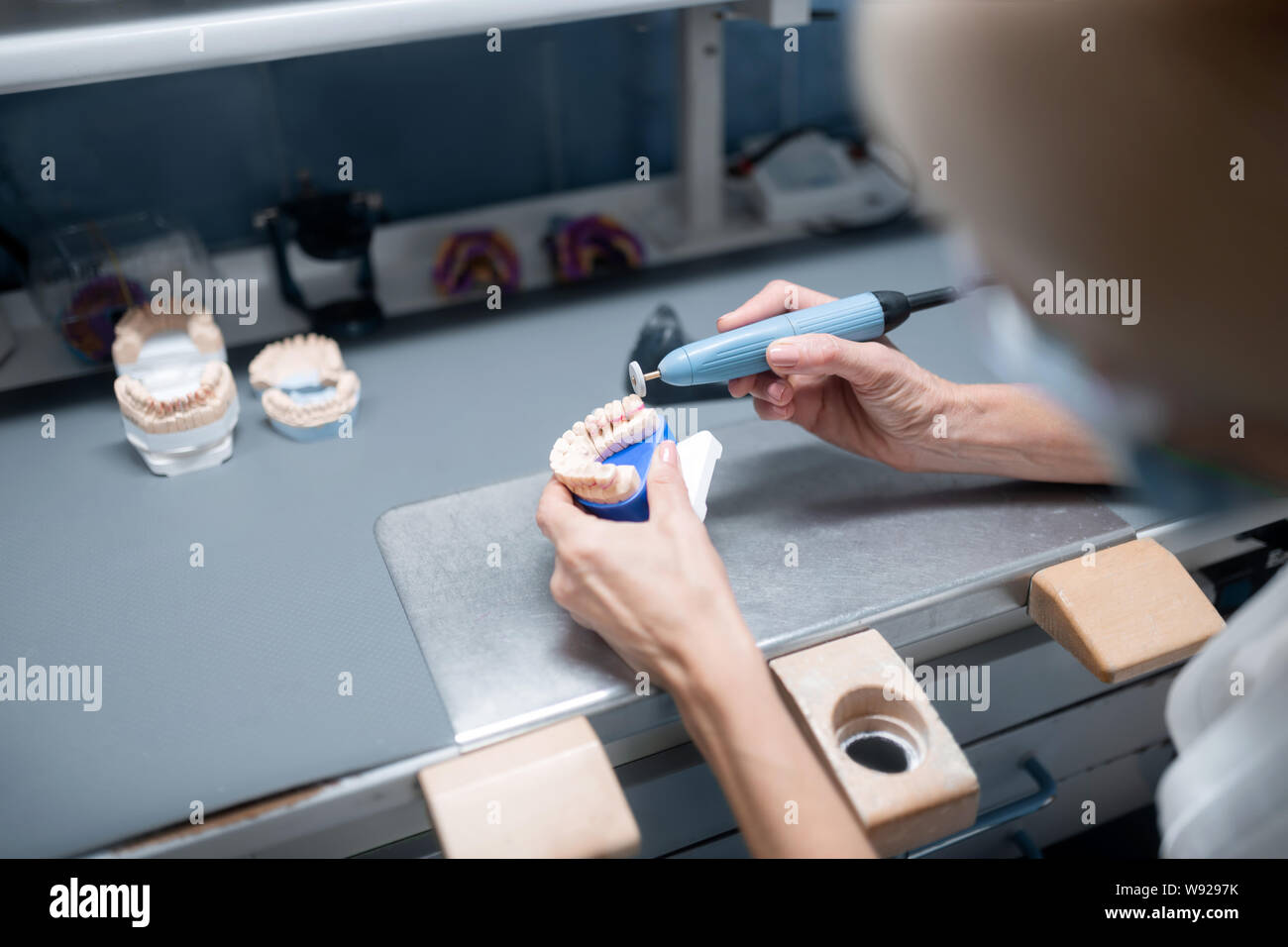 Polishing denture hi-res stock photography and images - Alamy