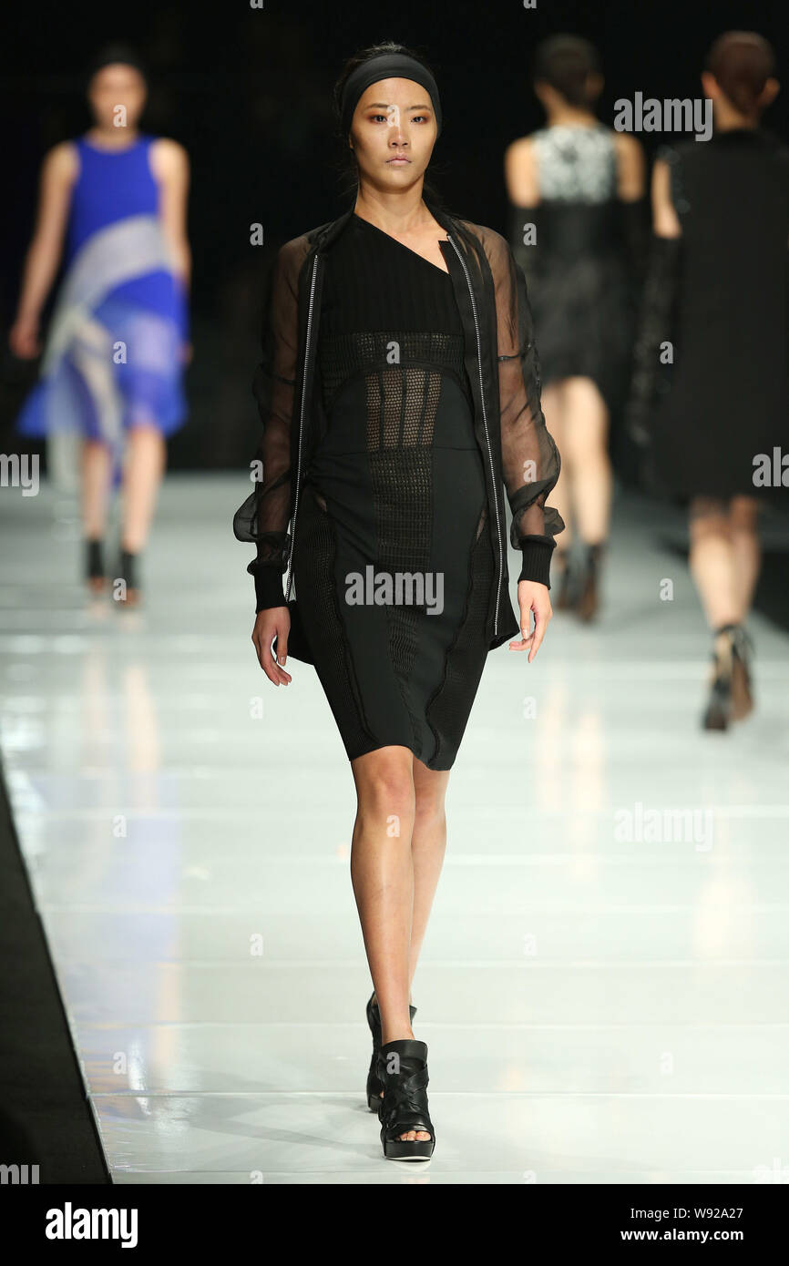 A model displays a new creation designed by Vera Wang at her fashion ...