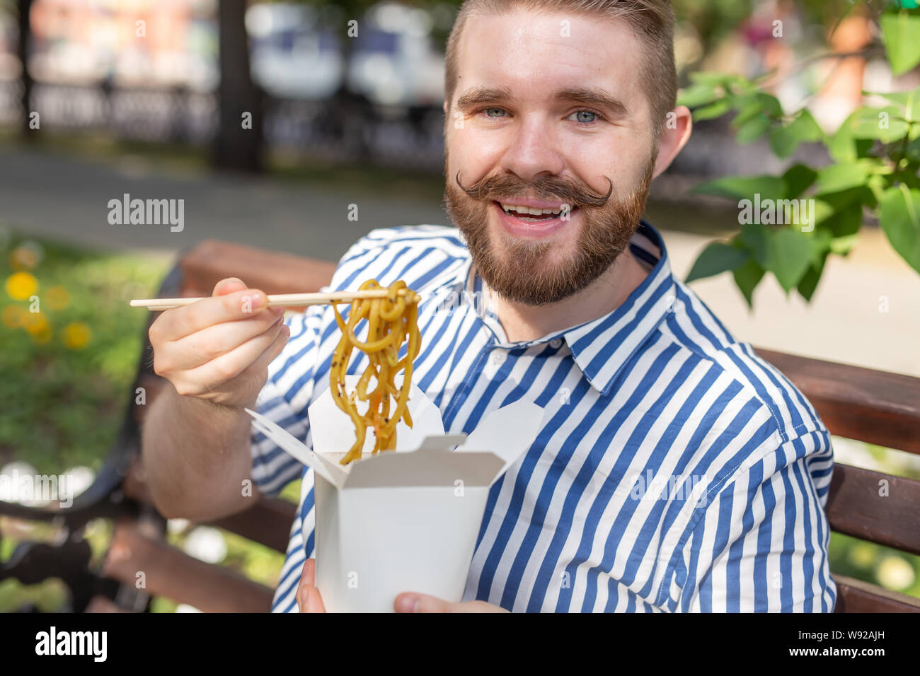 Male model sitting on box hi-res stock photography and images - Alamy