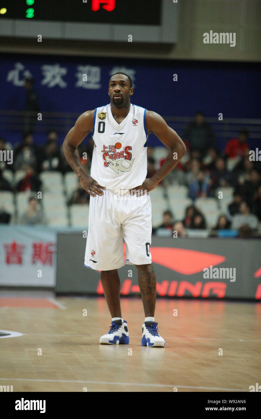 Gilbert Arenas of the Shanghai Sharks looks on in the 22th round match ...
