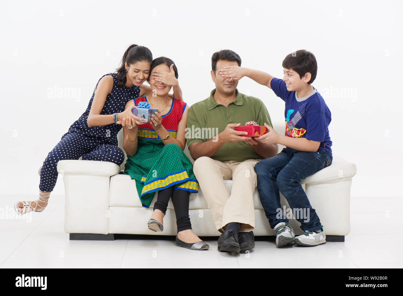 Children giving gifts to their parents Stock Photo - Alamy