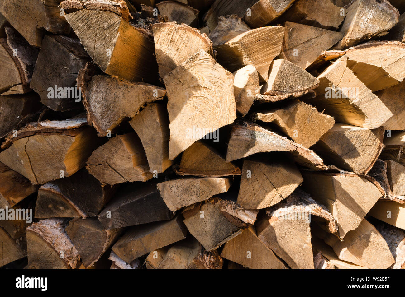 A neatly folded log of chopped wood. Country life. Fire melting Stock ...