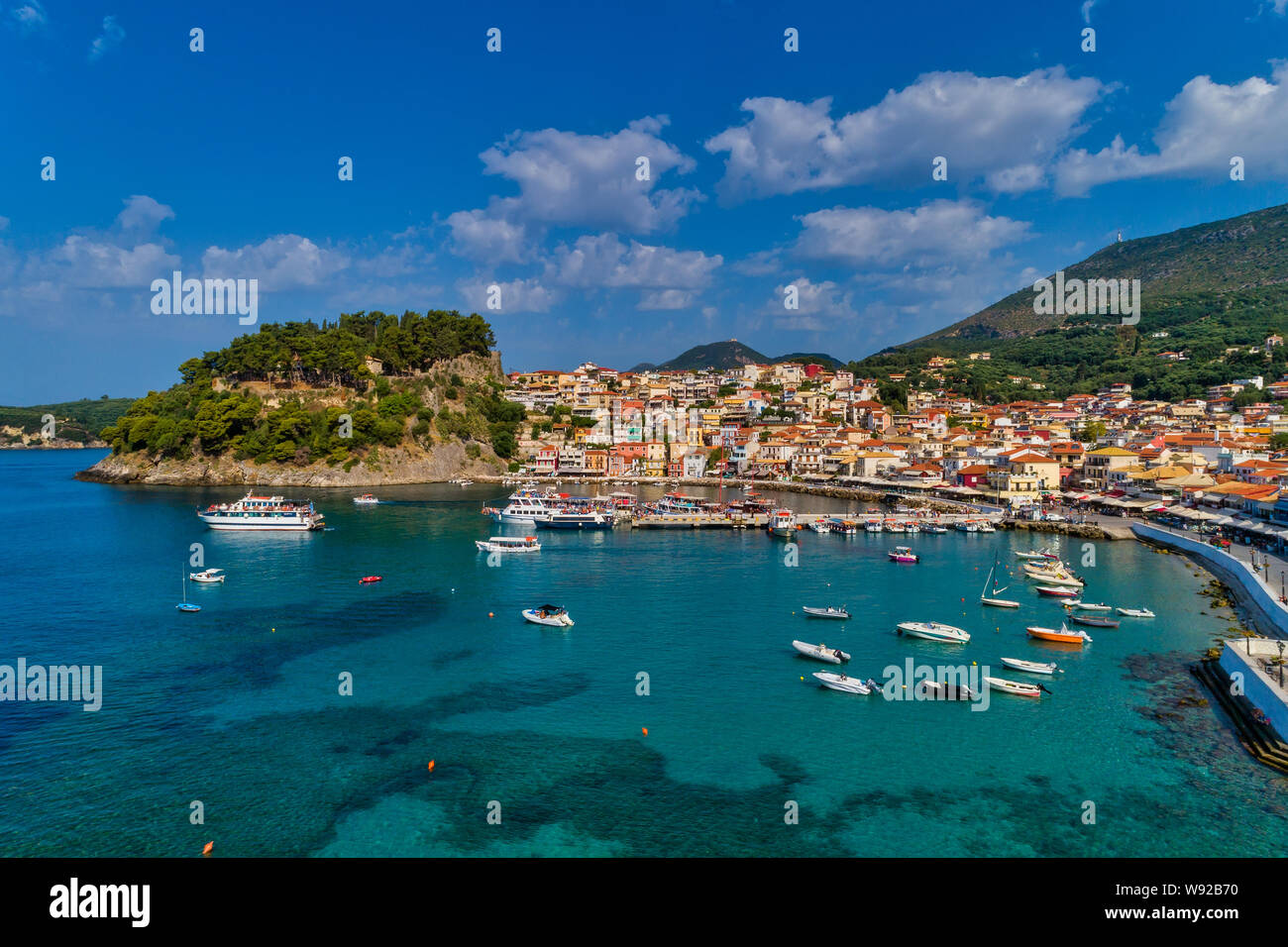 Aerial cityscape view of the coastal city of Parga, Greece during the ...