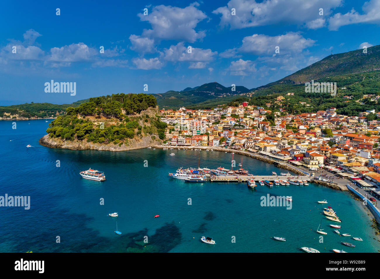 Aerial cityscape view of the coastal city of Parga, Greece during the ...