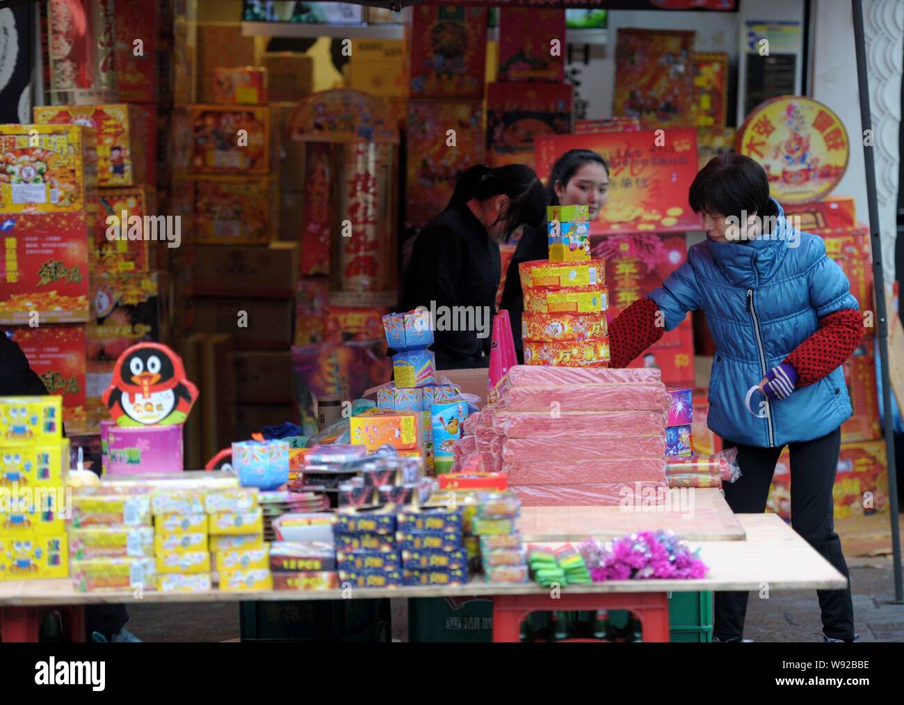 A Chinese vendor sells fireworks for the upcoming Chinese Lunar New ...