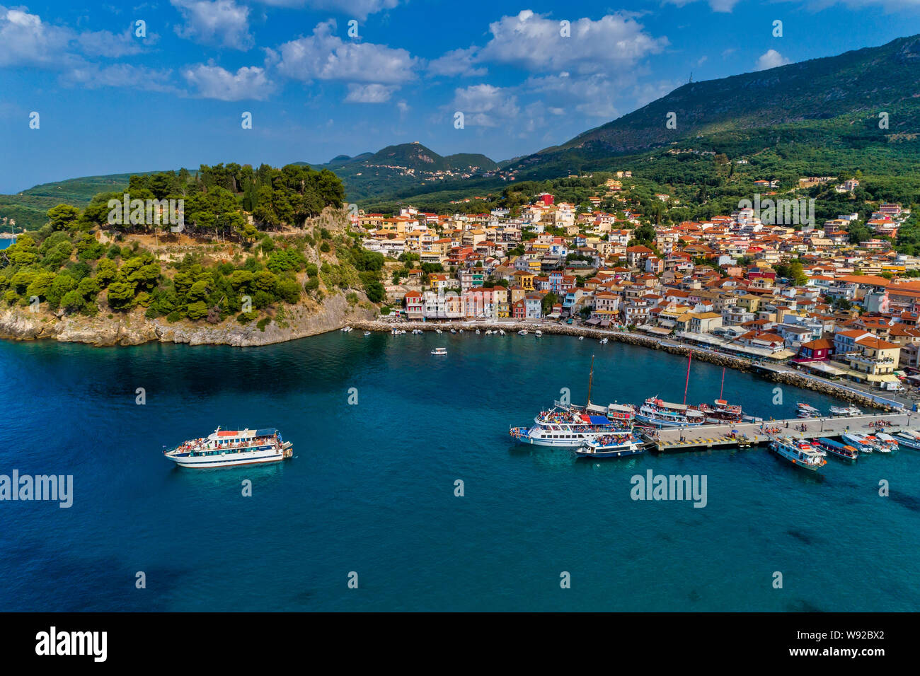 Aerial cityscape view of the coastal city of Parga, Greece during the ...