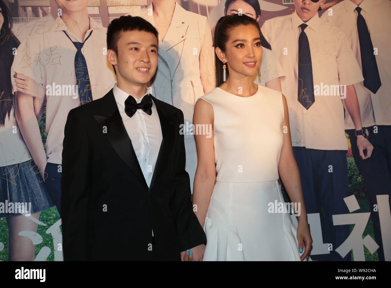 Chinese actress Li Bingbing, right, and actor Dong Zijian pose during a ...