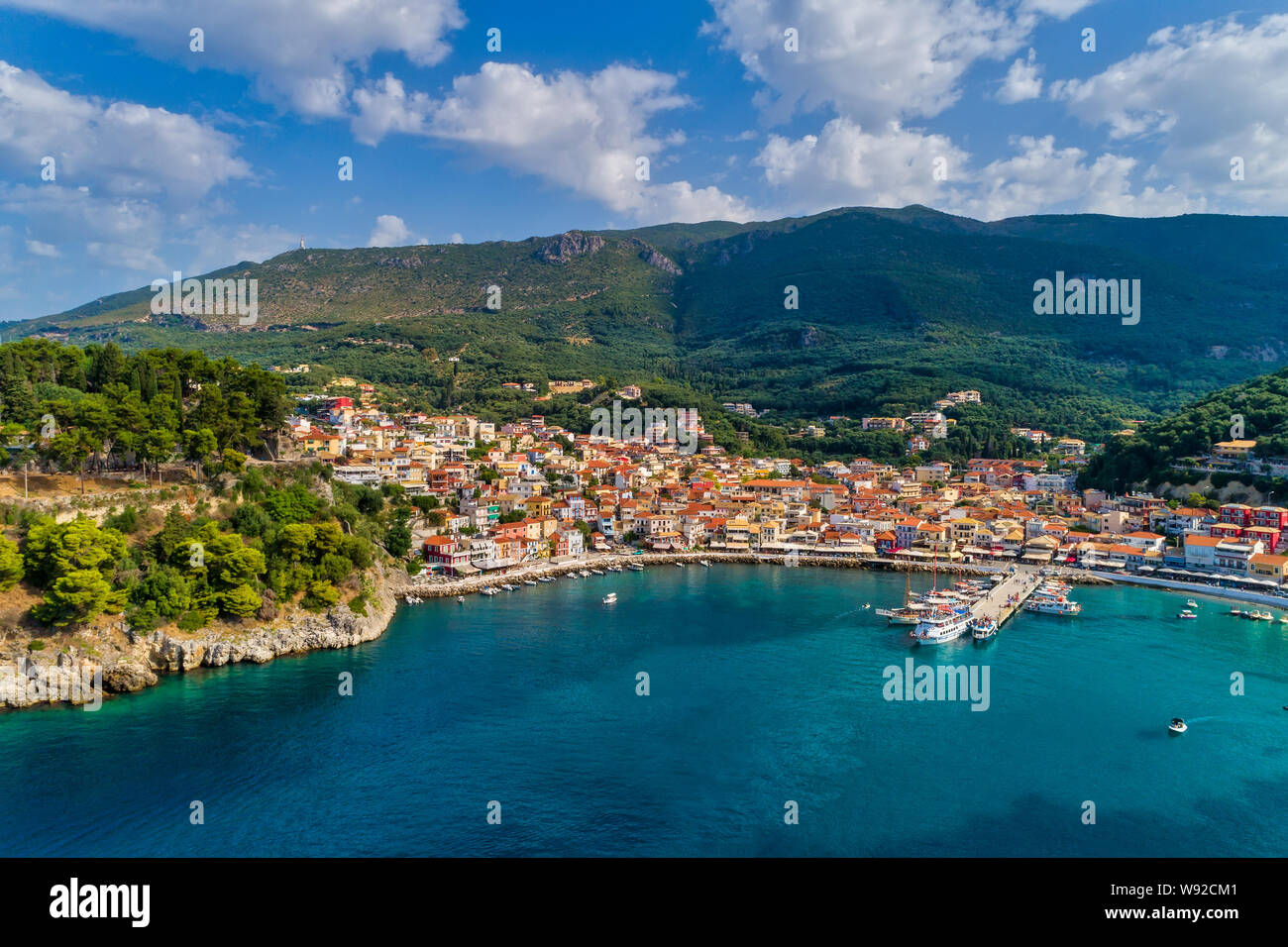 Aerial cityscape view of the coastal city of Parga, Greece during the ...