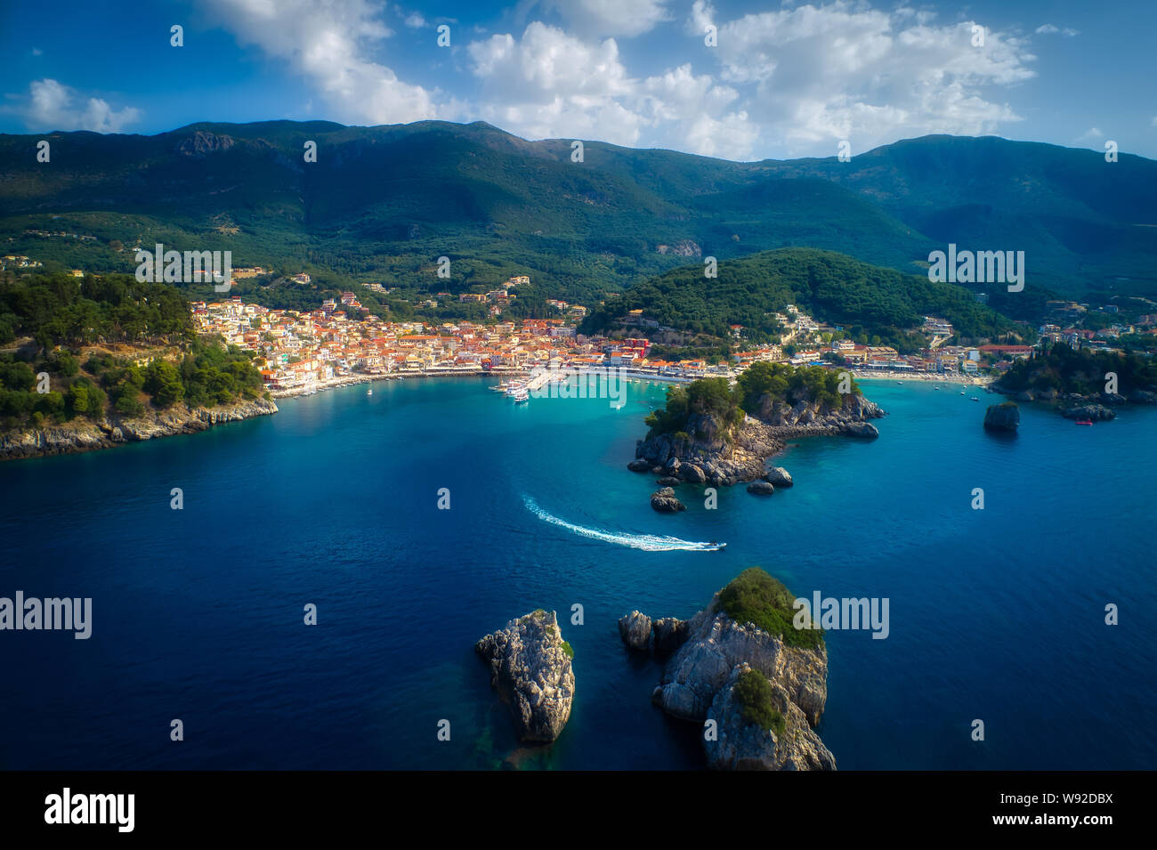 Aerial cityscape view of the coastal city of Parga, Greece during the ...