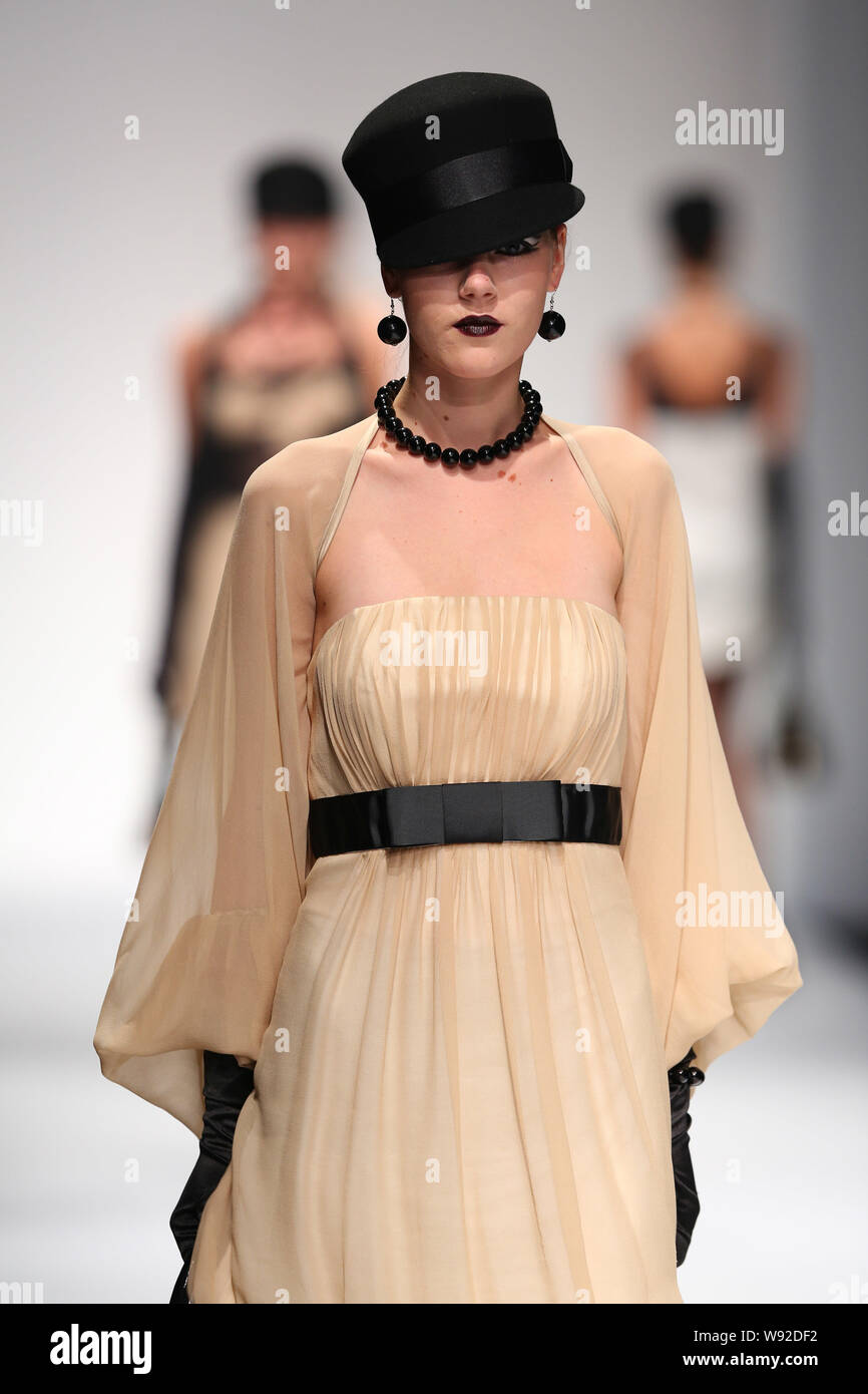 A model displays a new creation by designer Renato Nucci at his Renato ...