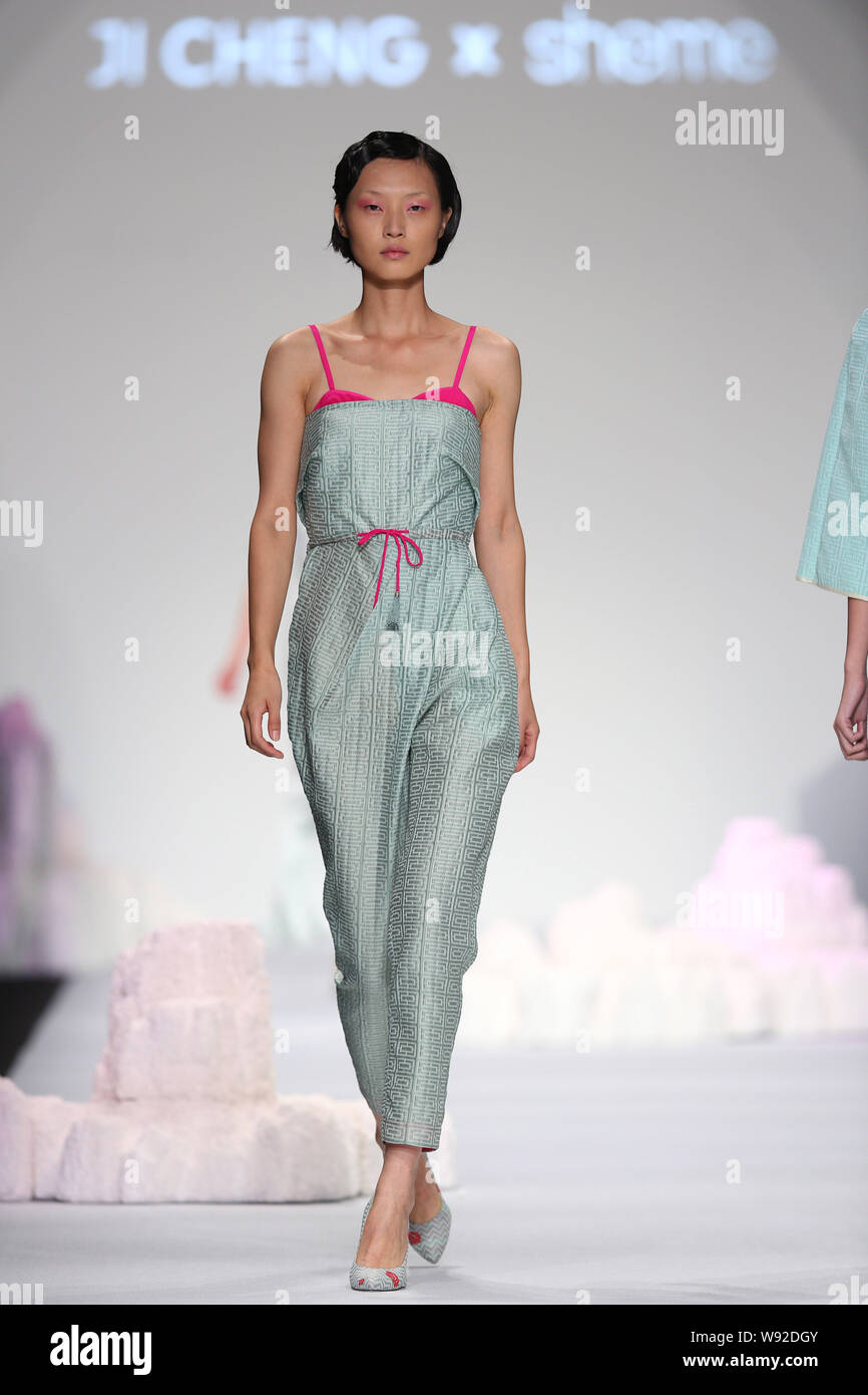 A model displays a new creation by female Chinese designer Ji Cheng at ...