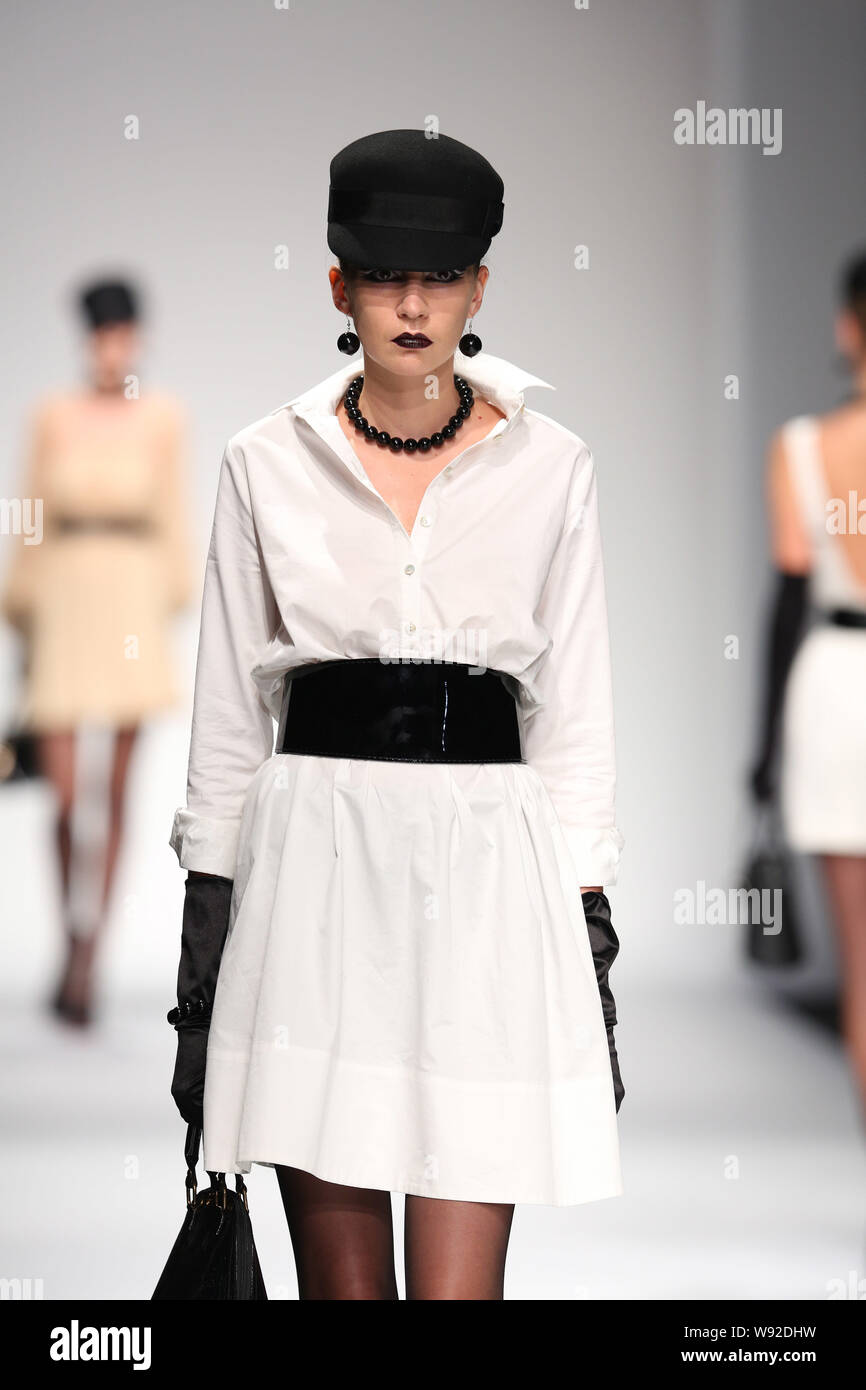A model displays a new creation by designer Renato Nucci at his Renato ...