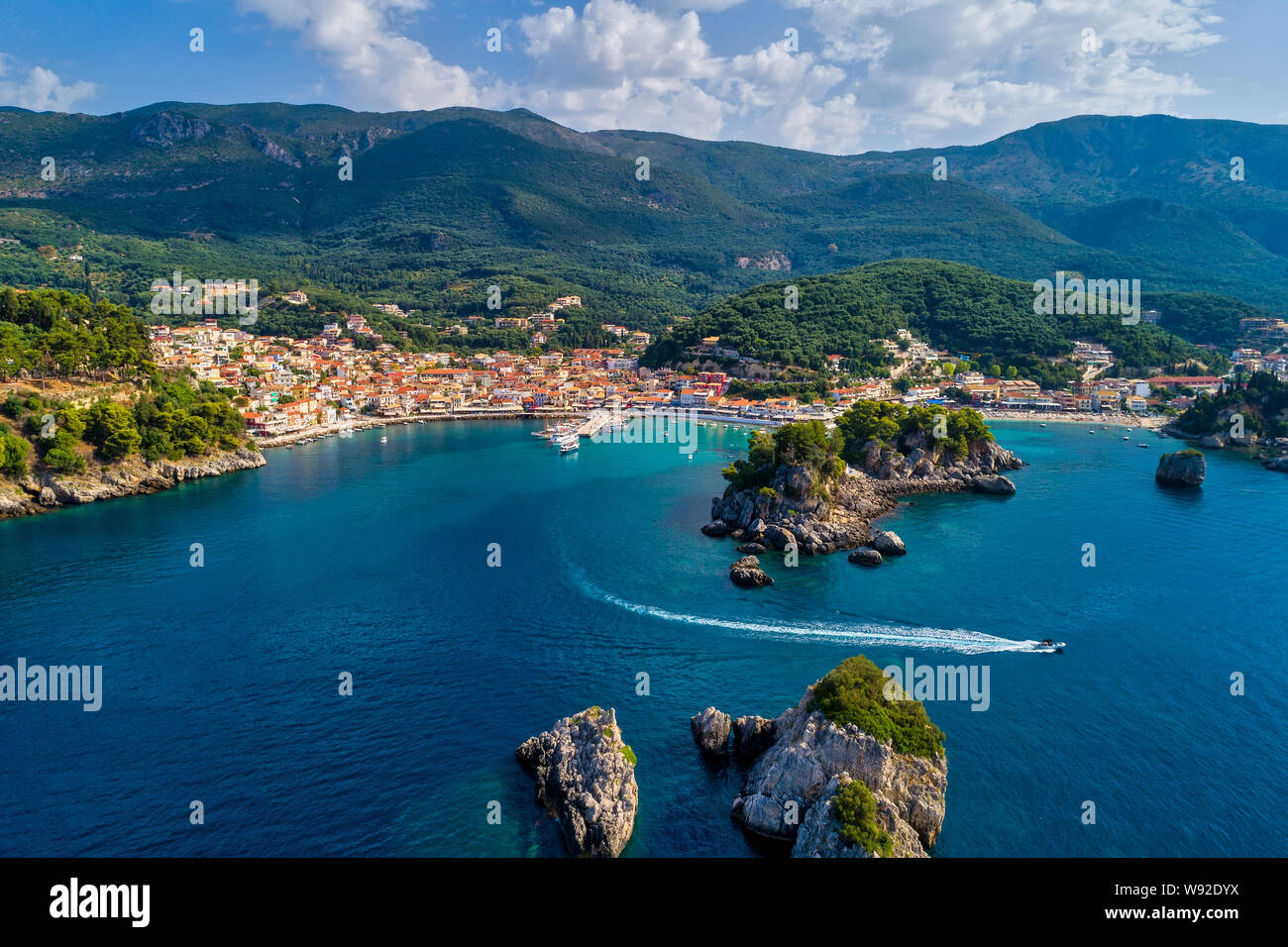 Aerial cityscape view of the coastal city of Parga, Greece during the ...