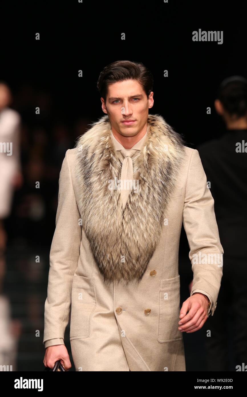 A model displays a new creation at a fashion show of Hugo Boss in ...