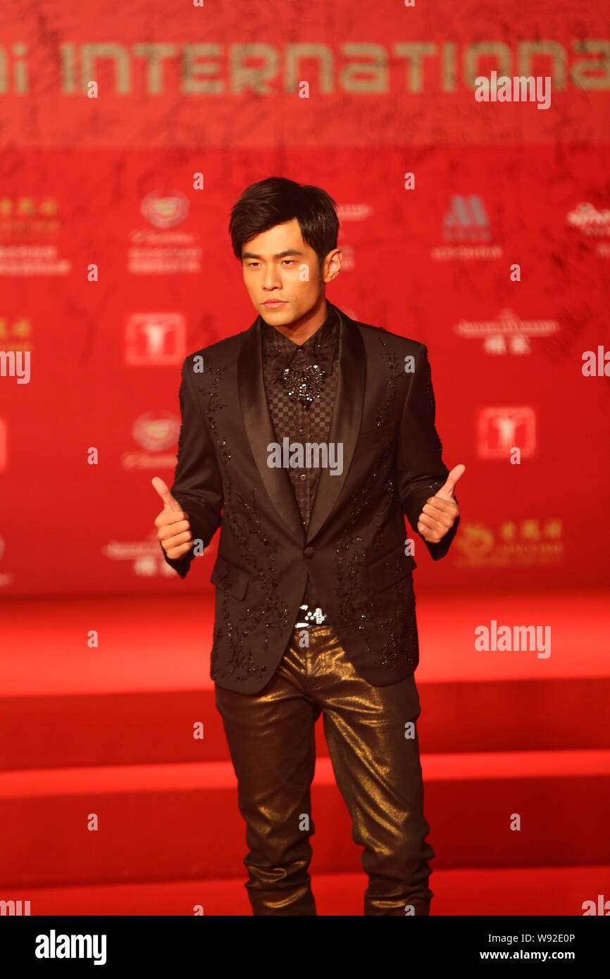 Taiwanese singer and actor Jay Chou poses on the red carpet as he ...