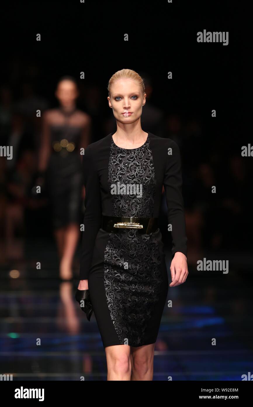 A model displays a new creation at a fashion show of Hugo Boss in ...