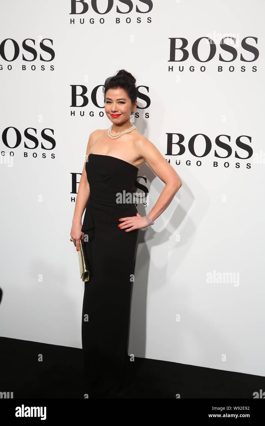 Hong Kong actress Cherie Chung poses as she arrives for a fashion show ...