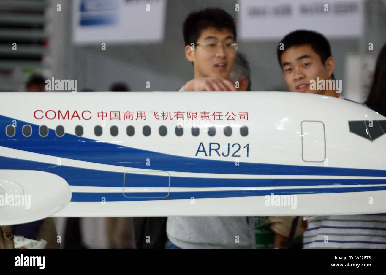 --FILE--Visitors look at a model of ARJ21 airplane of Commercial ...