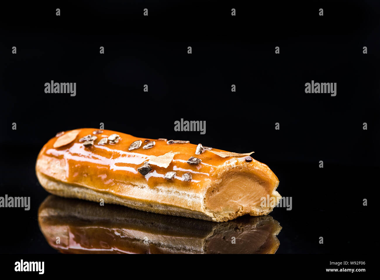 French Artisan Eclair on Black Reflective Background,Copy Space ...