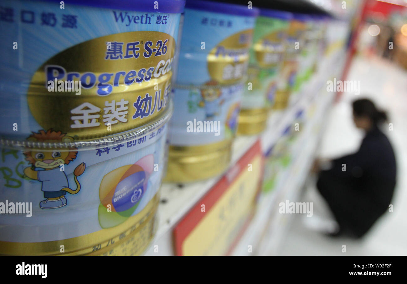 --FILE--Tins of Wyeth baby formula are for sale on the shelf at a ...