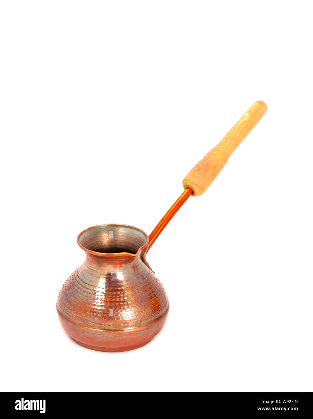 Small copper cezve for making Turkish coffee on a white background. No ...