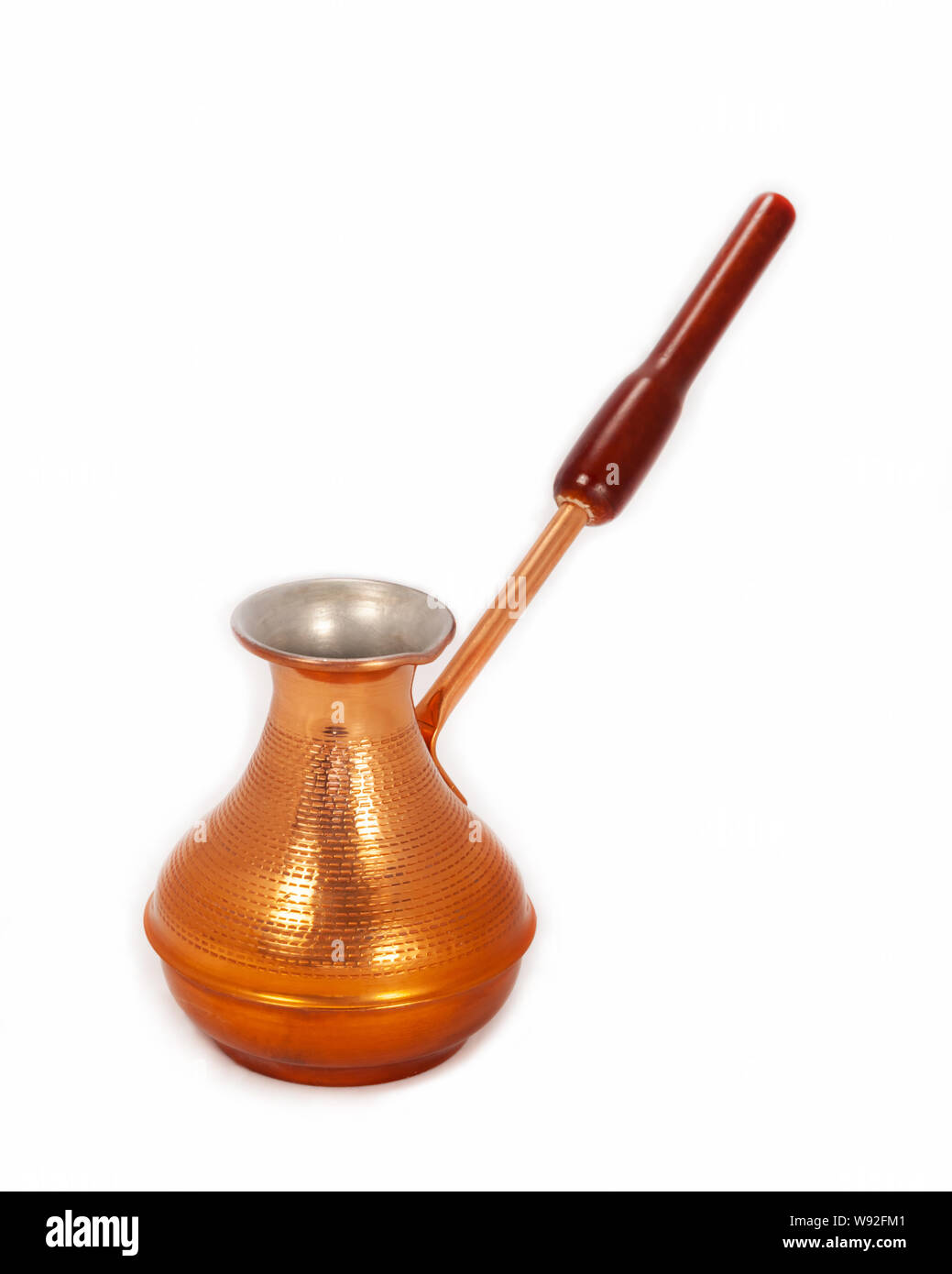 Medium-sized cezve for brewing Turkish coffee on a white background ...