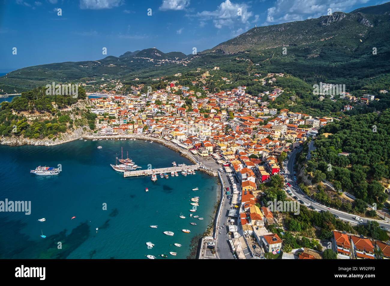 Aerial cityscape view of the coastal city of Parga, Greece during the ...