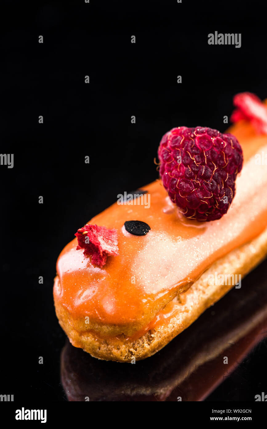 French Artisan Eclair on Black Reflective Background,Copy Space ...