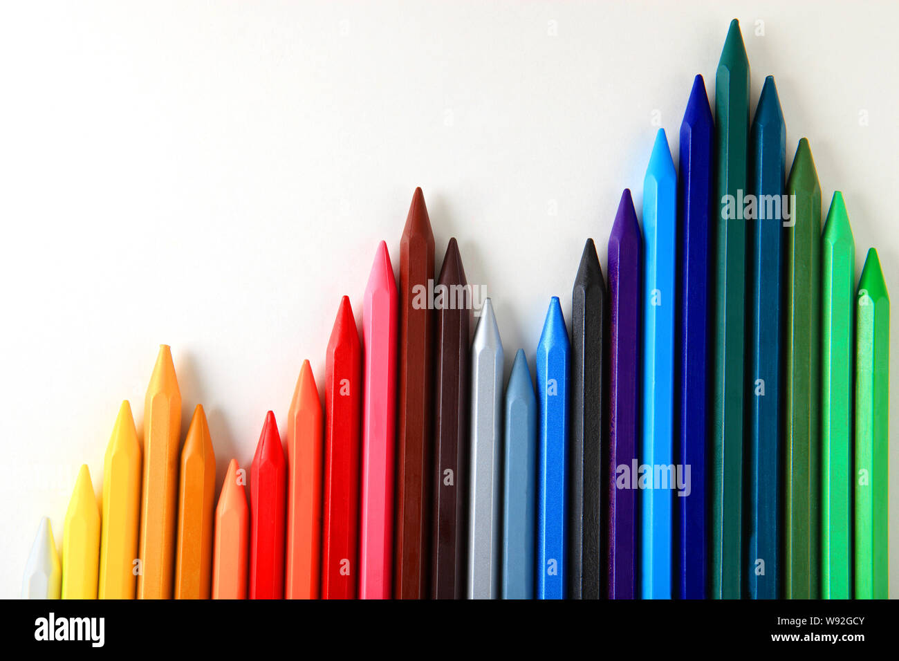 Crayons representing progress graph Stock Photo - Alamy