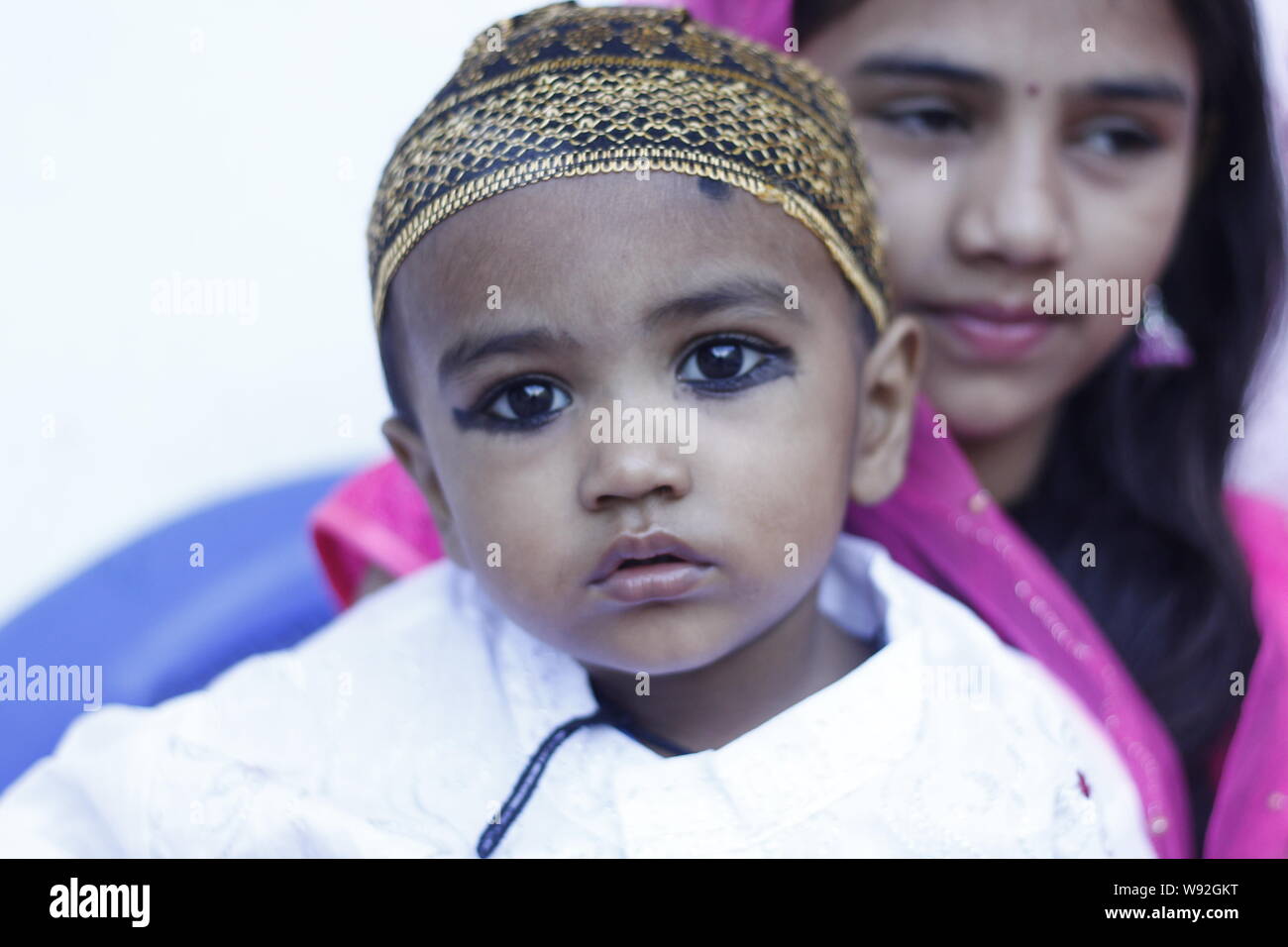 Kathmandu, Nepal. 12th Aug, 2019. A Nepalese Muslim boy looks on during ...