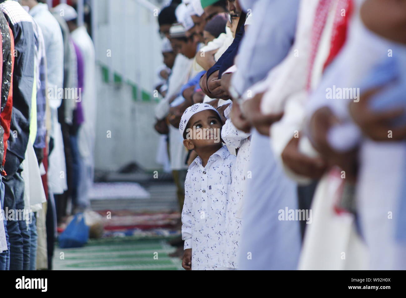 Kathmandu, Nepal. 12th Aug, 2019. A Nepalese Muslim boy looks his ...