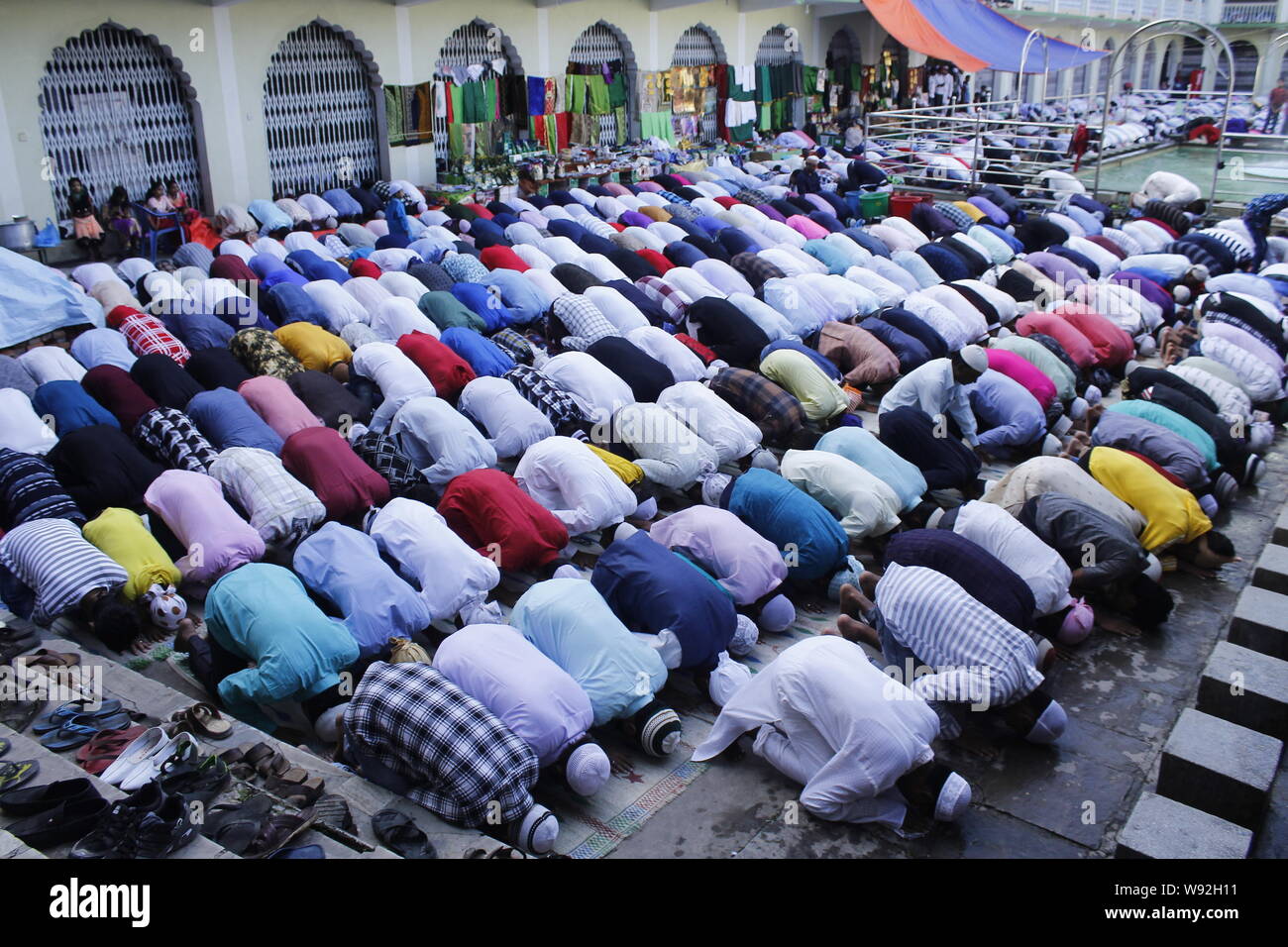Nepalese Muslims attend the mass prayer during the Eid al-Adha ...