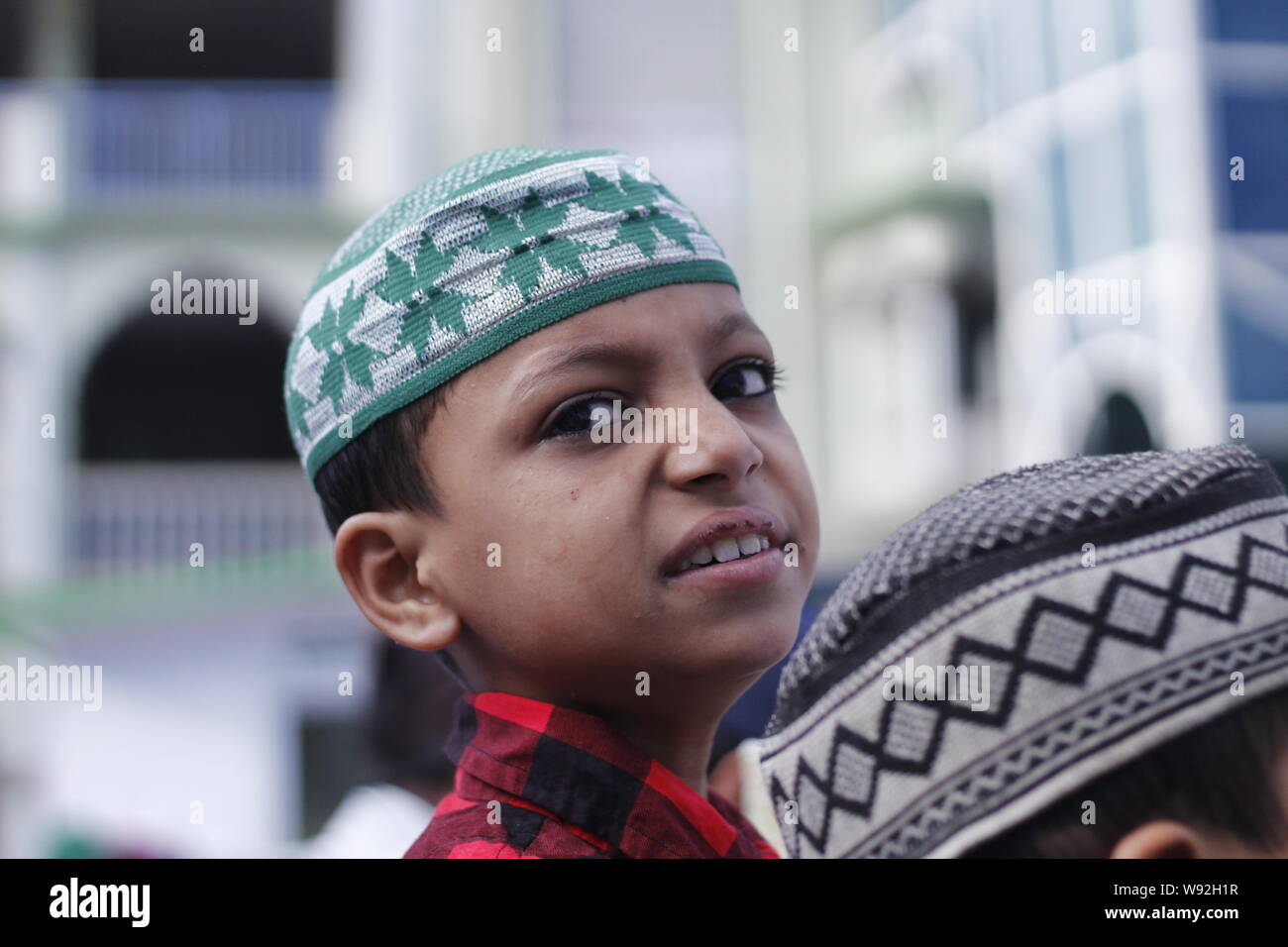 Kathmandu, Nepal. 12th Aug, 2019. A Nepalese Muslim boy looks on during ...
