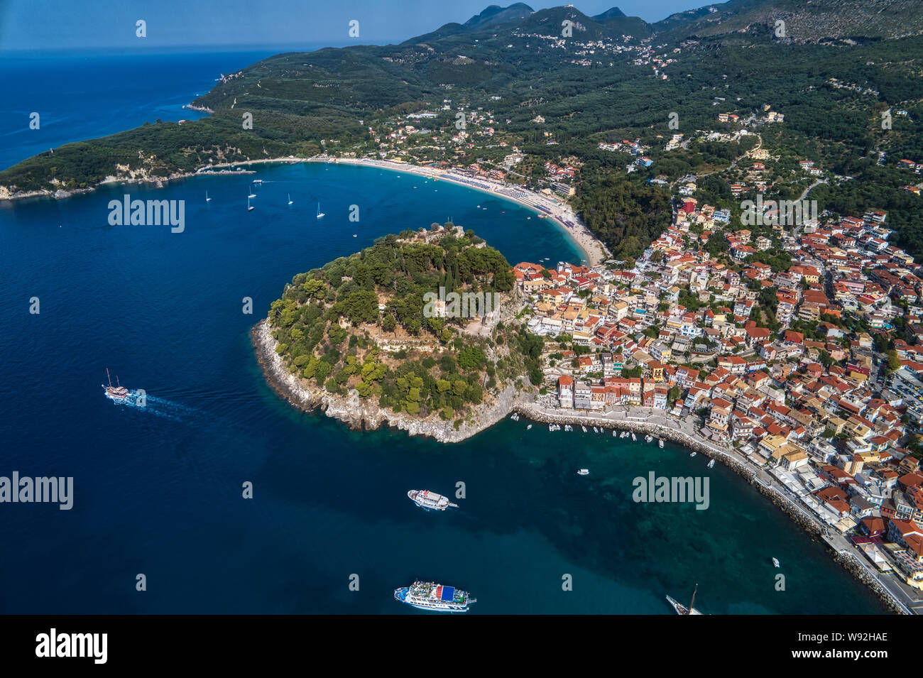 Aerial cityscape view of the coastal city of Parga, Greece during the ...