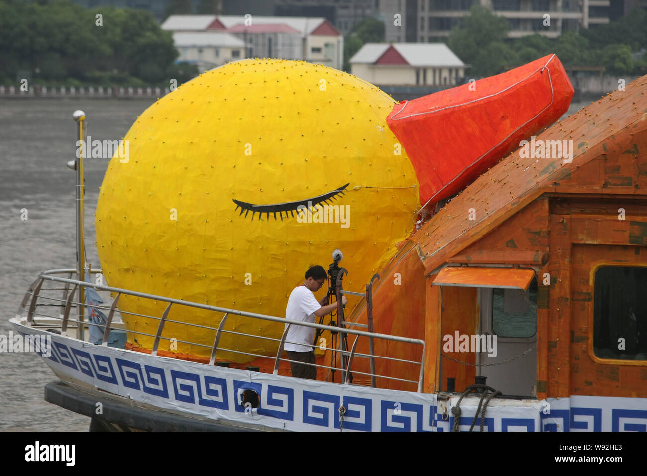 A photographer takes photos of the ferry, which adapted the design of ...