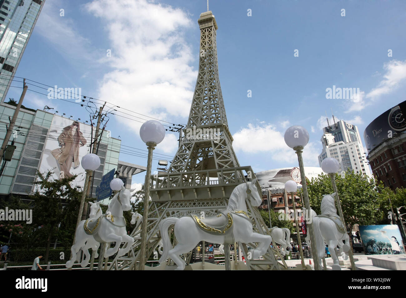 A scale model of Eiffel Tower is displayed in front of the Plaza 66 ...