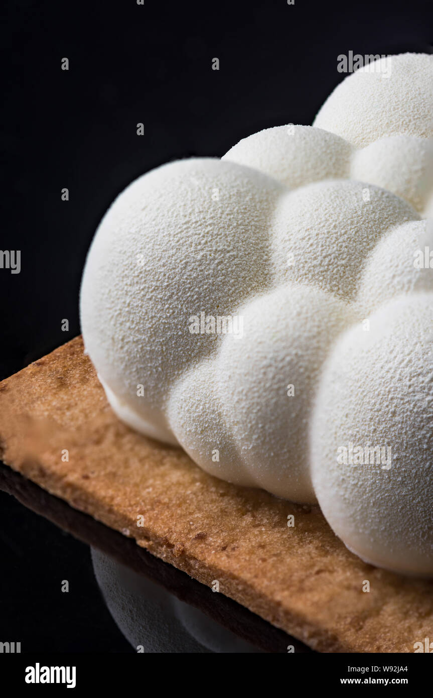 Artisan Monoportion Patisserie Dessert Cake on Black Reflective ...