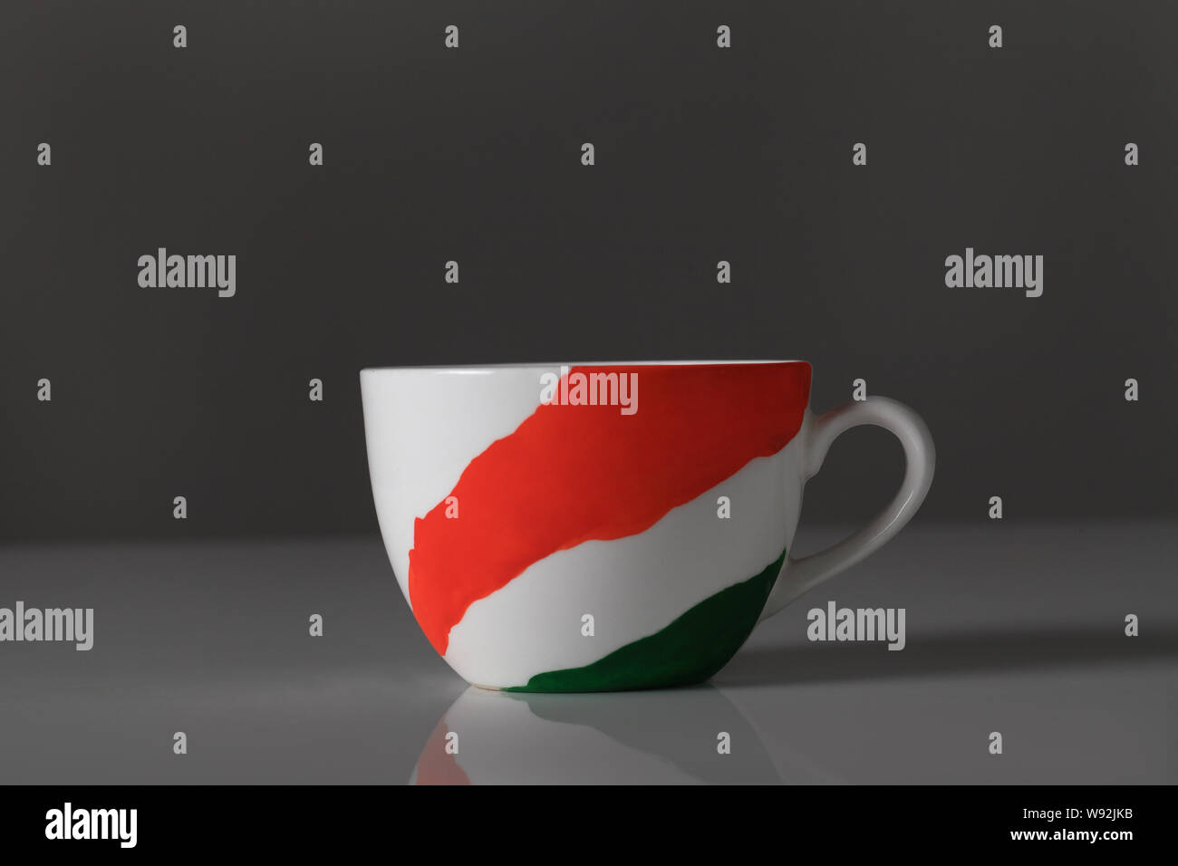 Cup of herbal tea representing Indian Flag Stock Photo - Alamy
