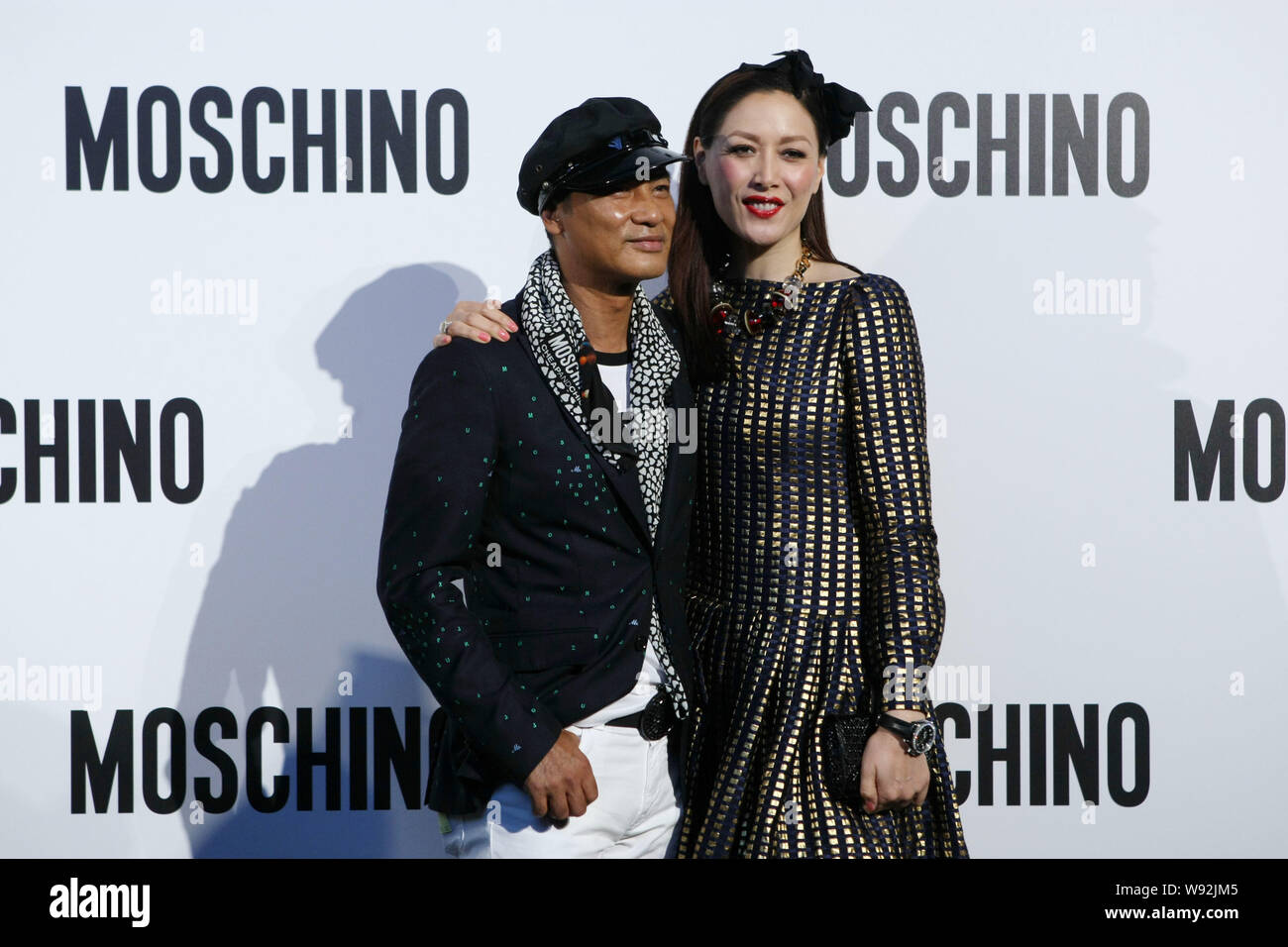 Hong Kong actor Simon Yam, left, poses with his wife Sophia Kao as they ...