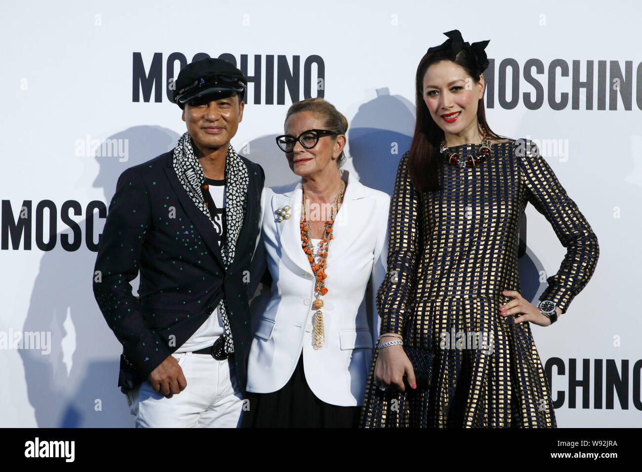 Hong Kong actor Simon Yam, left, poses with his wife Sophia Kao, right ...