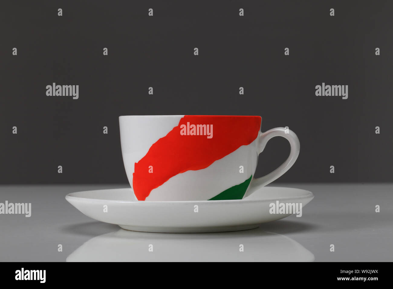 Cup of herbal tea representing Indian Flag Stock Photo - Alamy