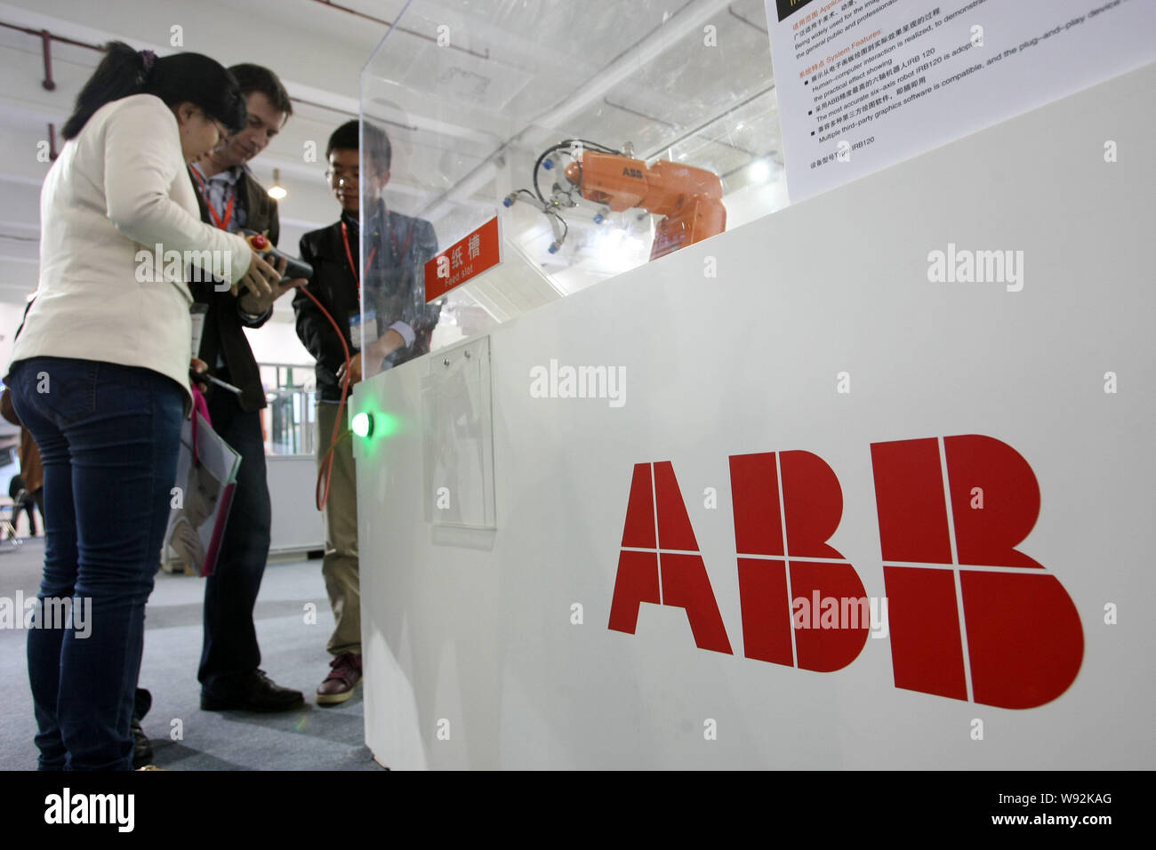People visit the stand of ABB during the first China (Shanghai ...