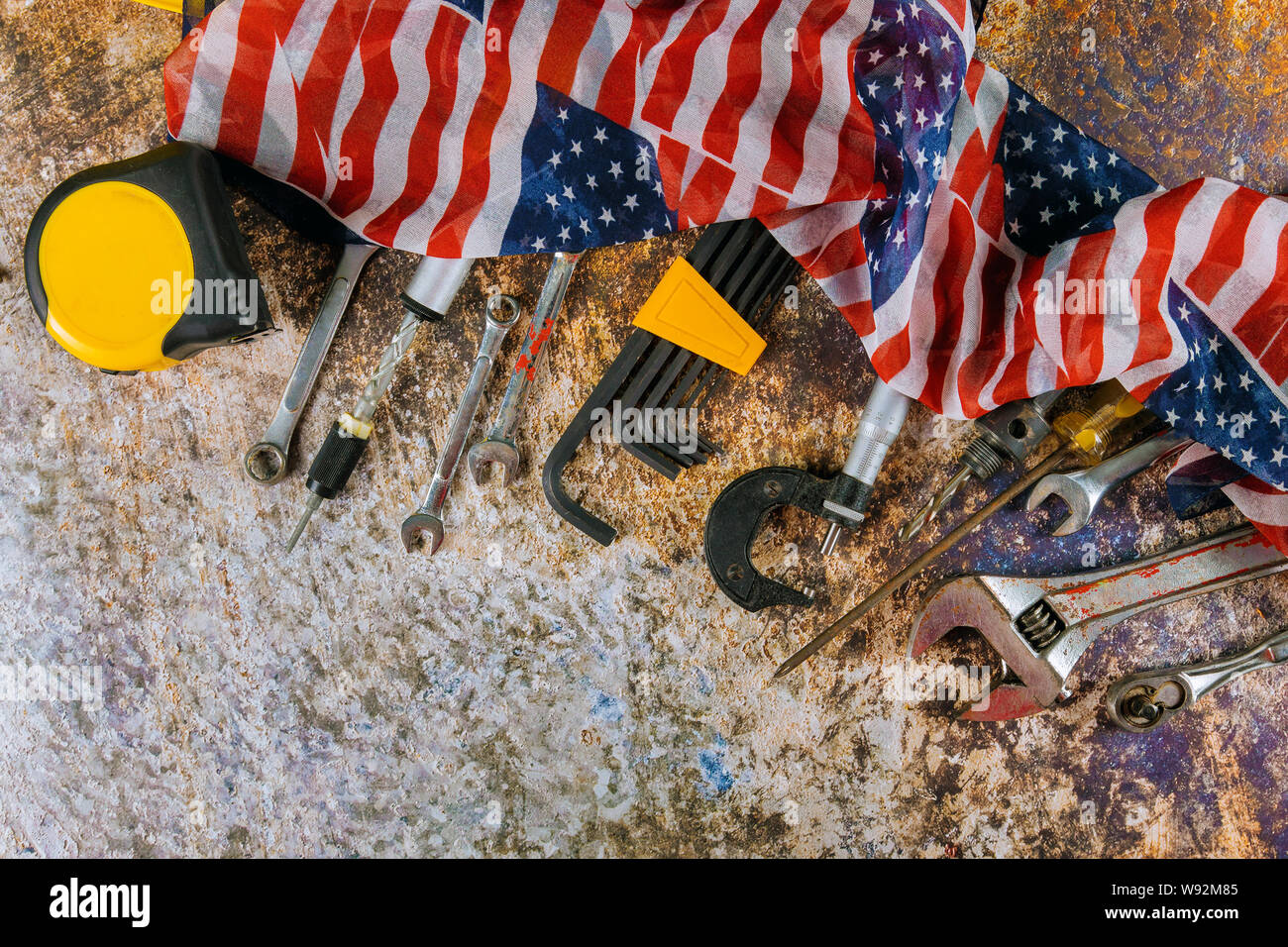 Wrench constructor tools on a United States of America flag in Labor ...