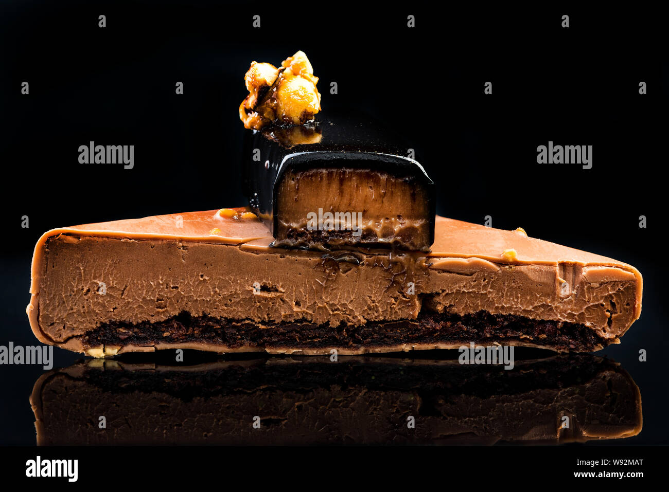 Artisan Monoportion Patisserie Dessert Cake on Black Reflective ...