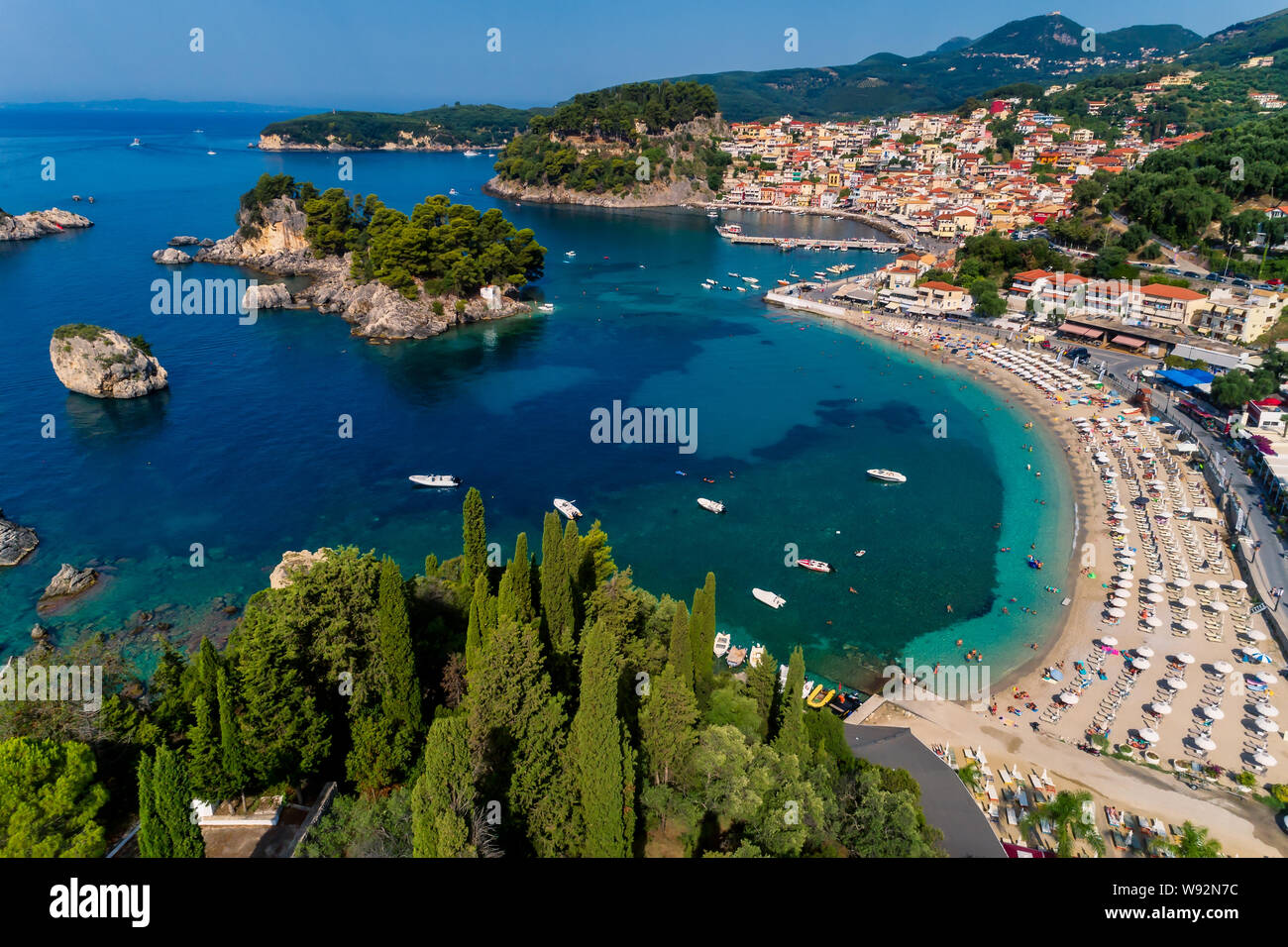 Aerial cityscape view of the coastal city of Parga, Greece during the ...