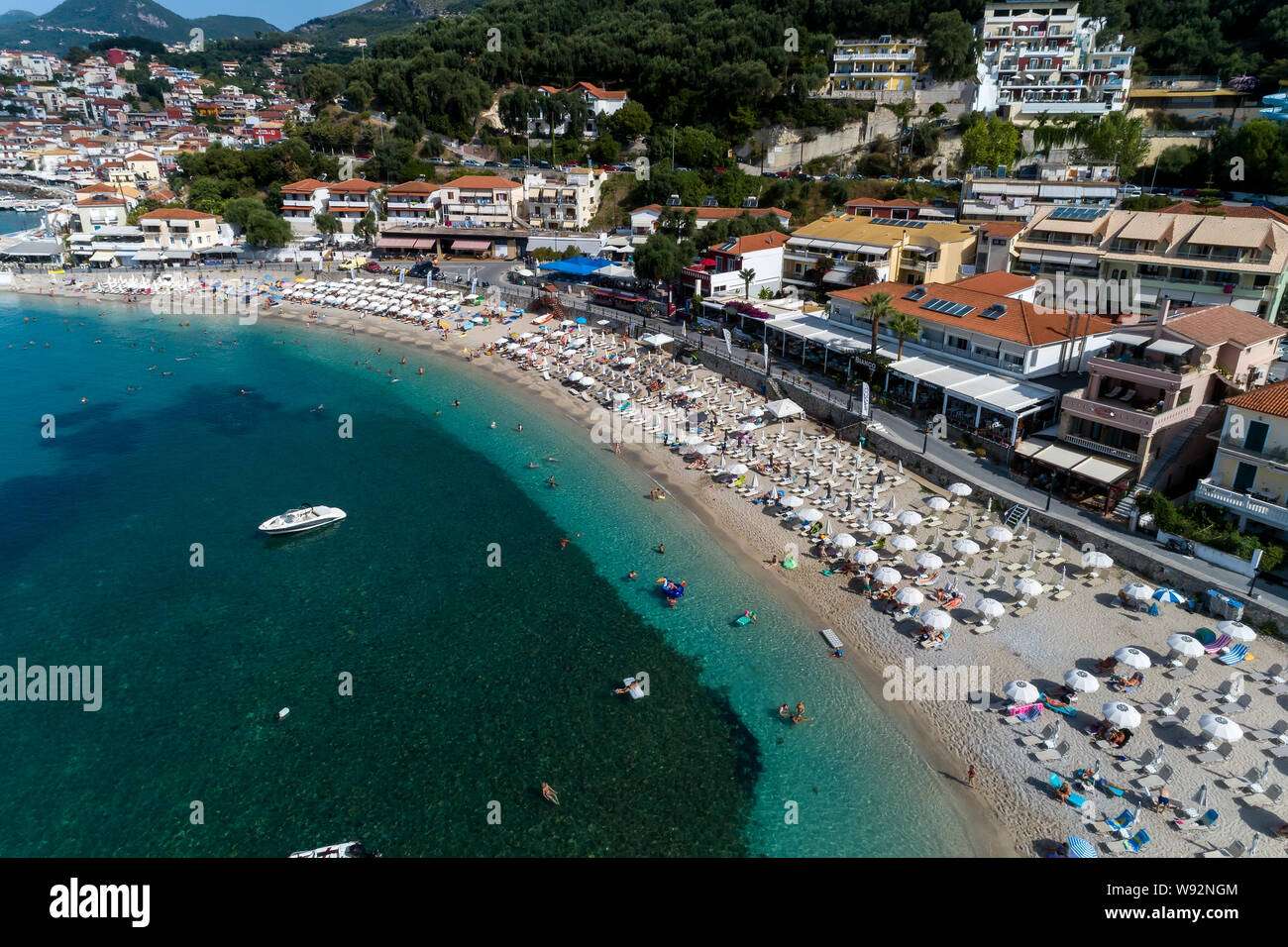 Aerial cityscape view of the coastal city of Parga, Greece during the ...
