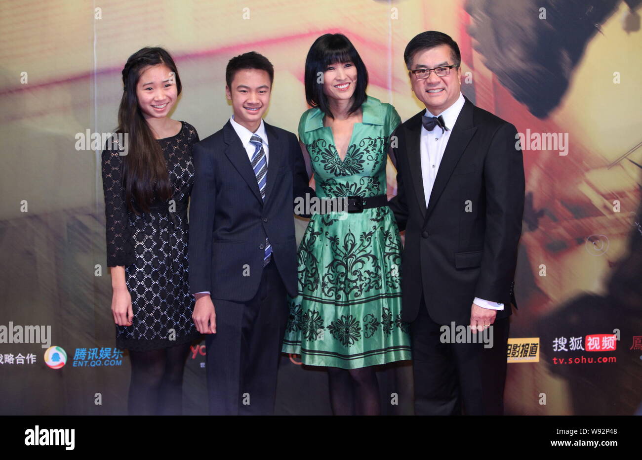 --FILE--U.S. Ambassador to China Gary Locke, right, poses with his ...