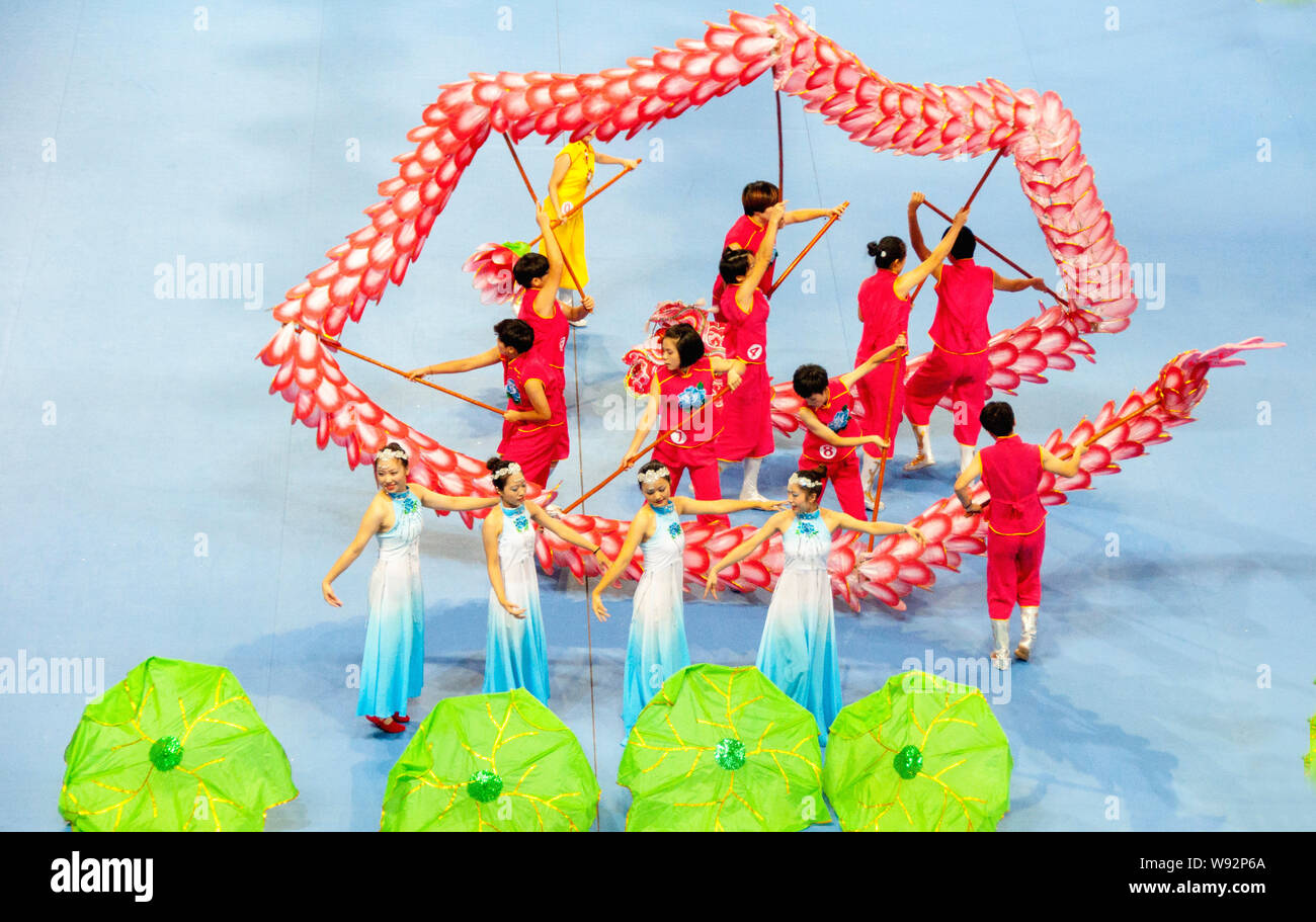 Chinese college students perform dragon dance during the final of 6th ...