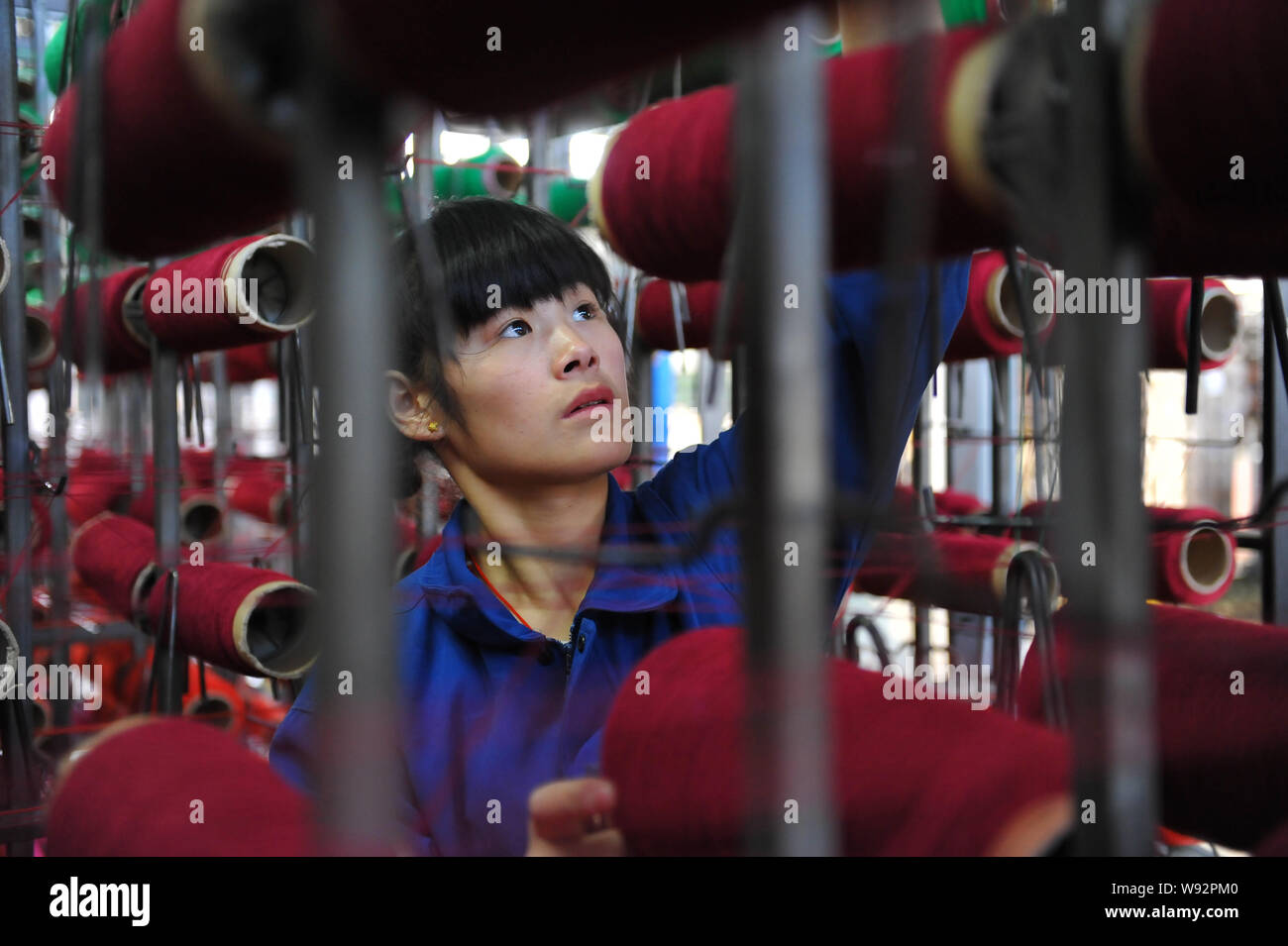 Female chinese worker checks hi-res stock photography and images - Alamy